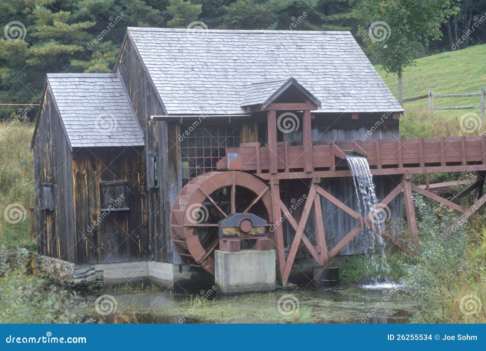 An old brown water mill stock photo. Image of engineering - 26255534