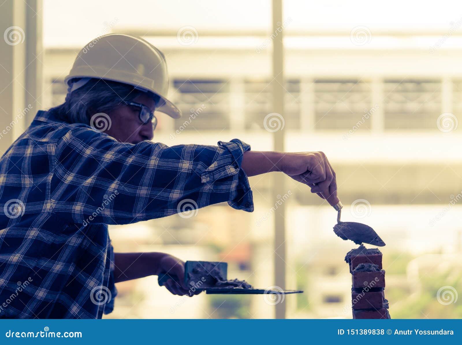 Old Builder Craftman is Leveling Brick Stock Photo - Image of ...