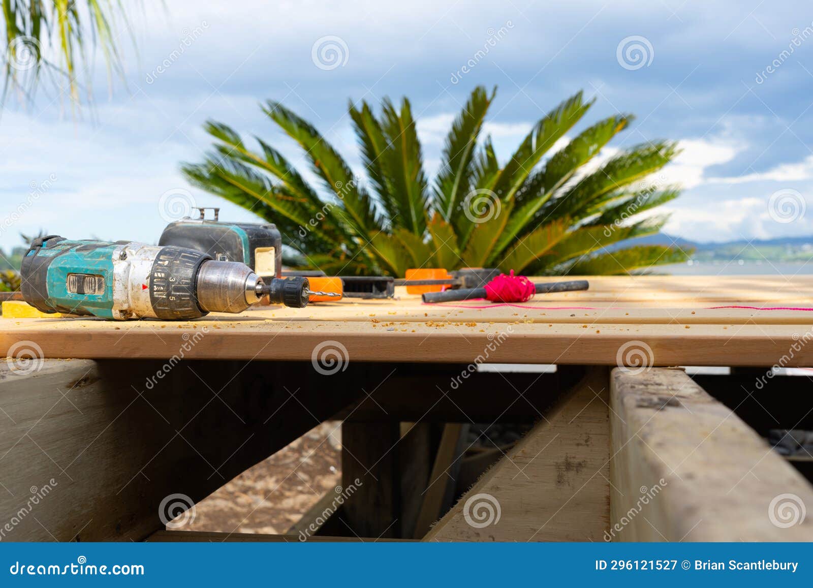 Old Builders Tools and Red String on New Wooden Decking Under ...