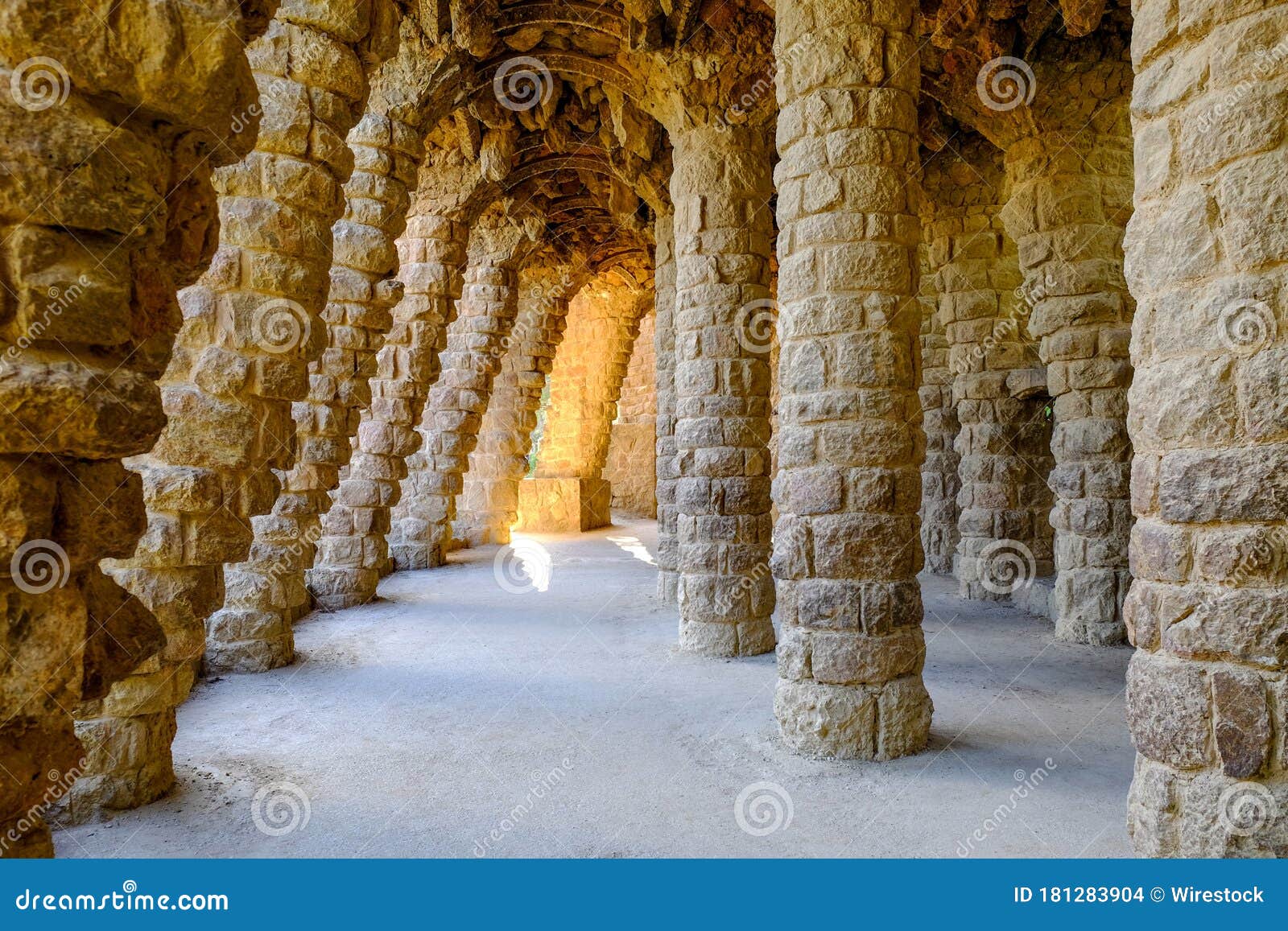 Old Building with Arched Pathway and Columns Stock Photo - Image of ...
