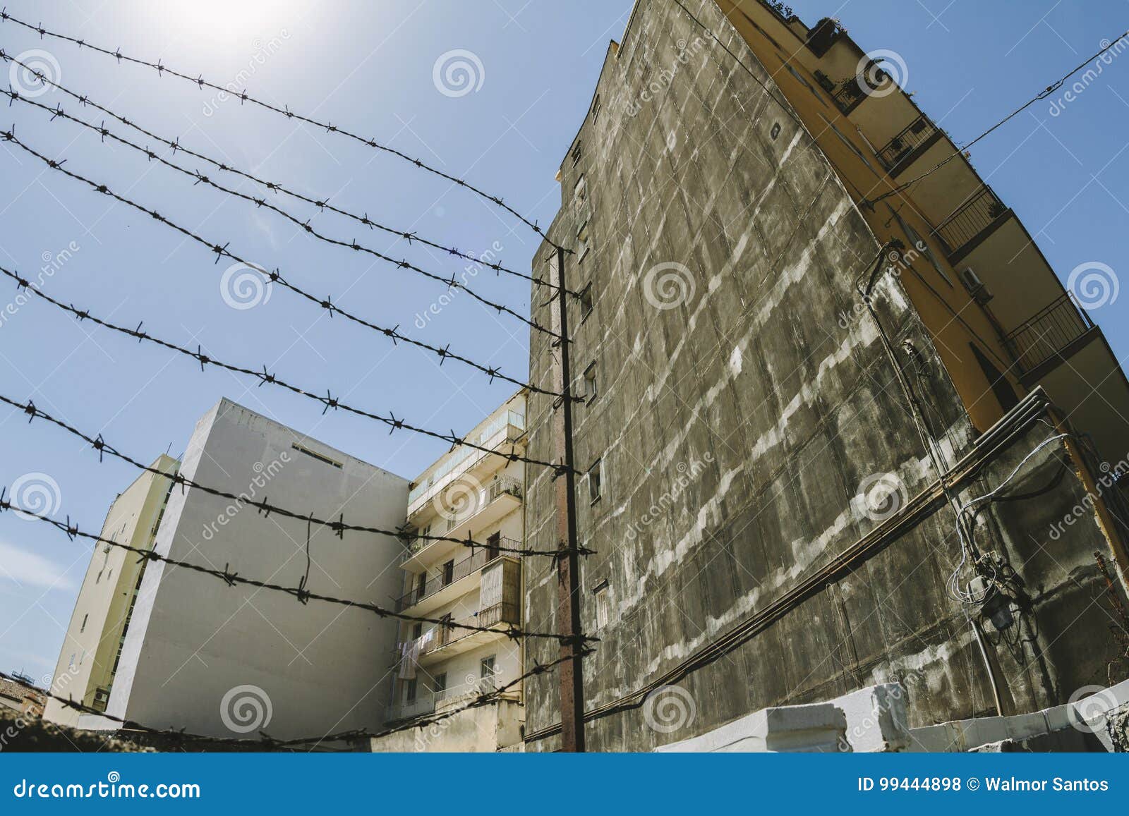 Barbed wire stock photo. Image of scaffolding, house - 99444898