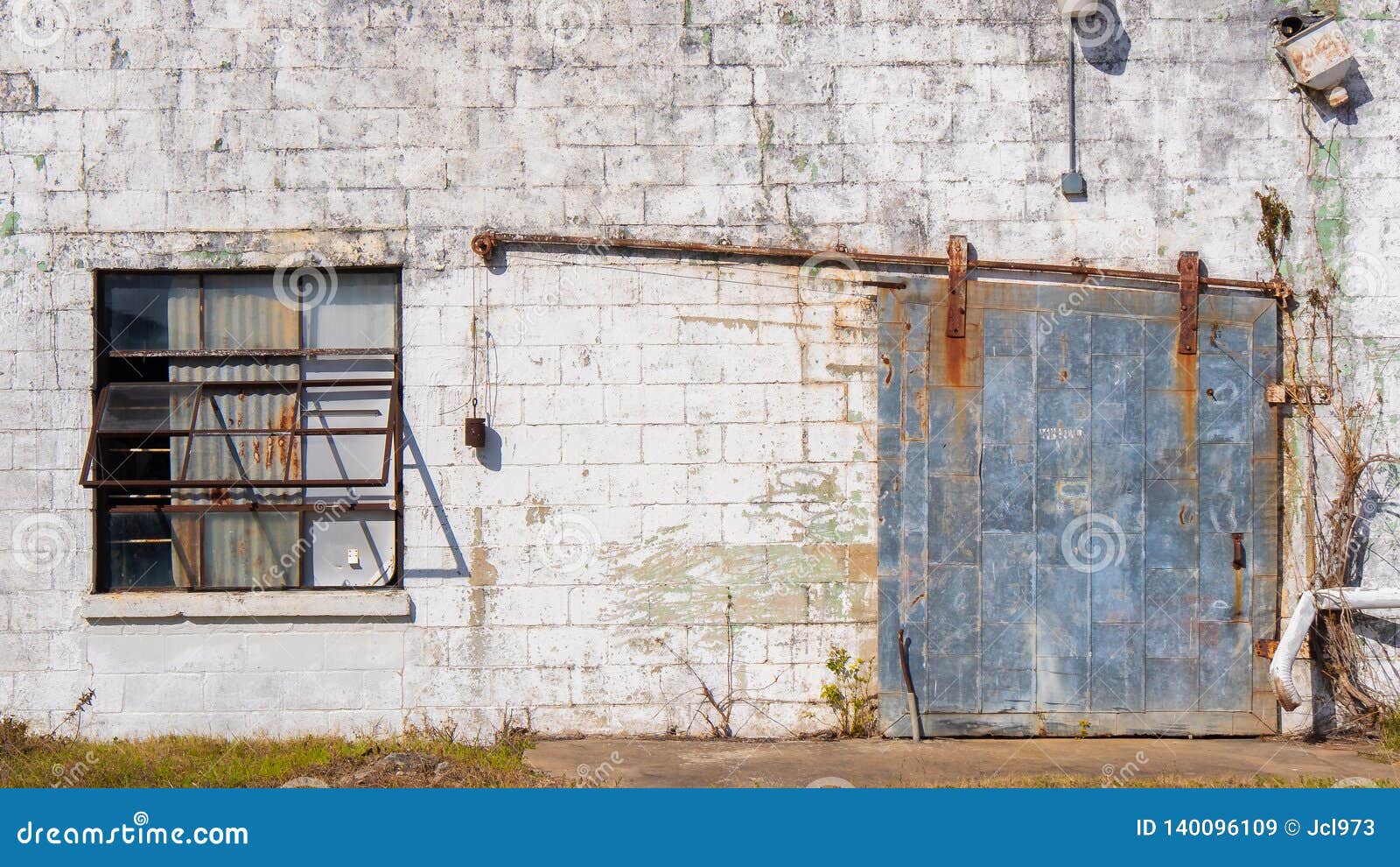 Old Building Textured Surface with Rusty Steel Door and Window Stock ...