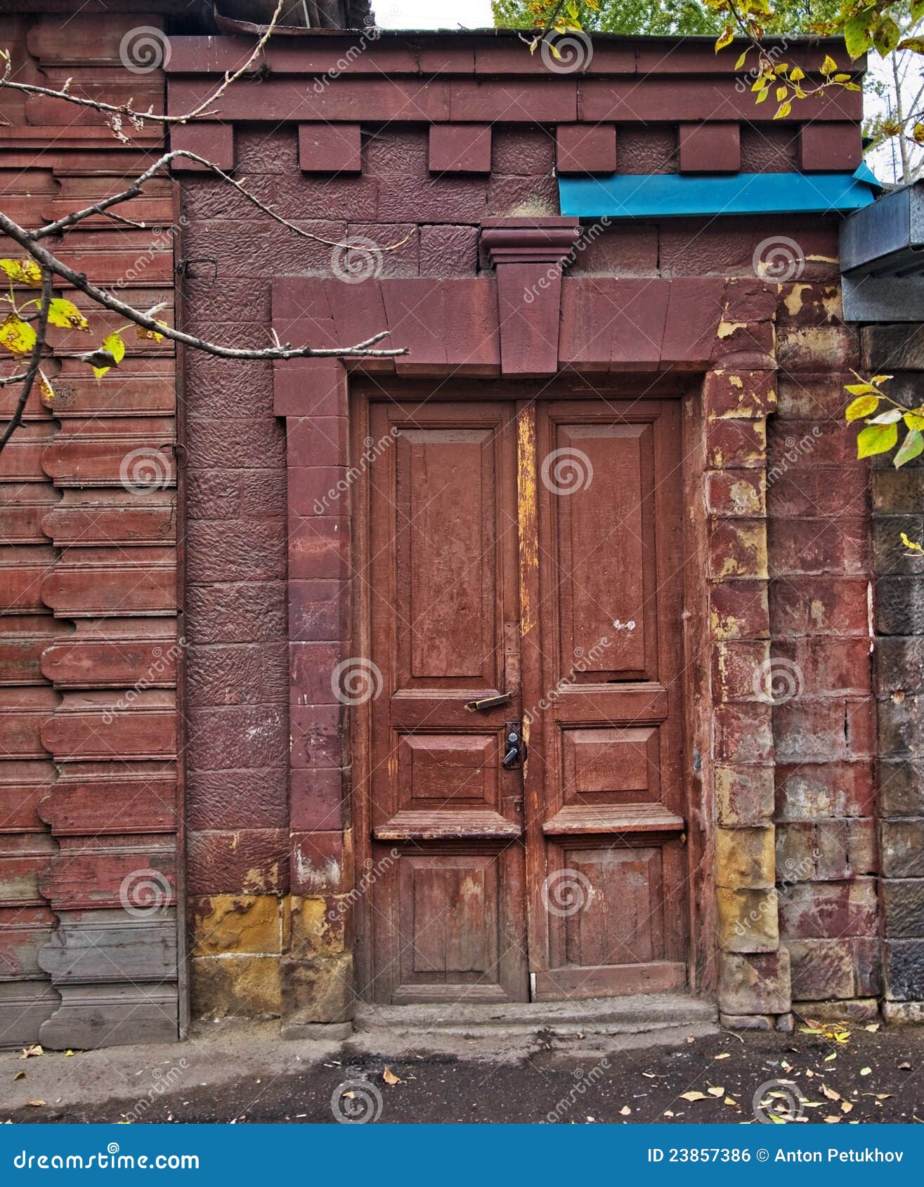 Old Building with Wooden Doors Stock Photo - Image of derelict, shut ...