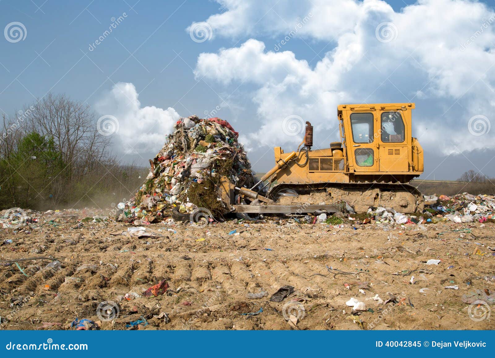 The Old Bulldozer Moving Garbage Stock Image - Image of dump, moving ...