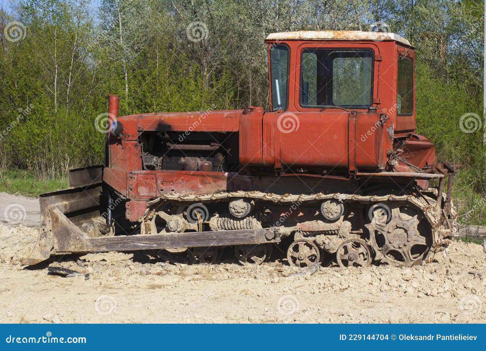 Old bulldozer. Side view stock photo. Image of construction - 229144704