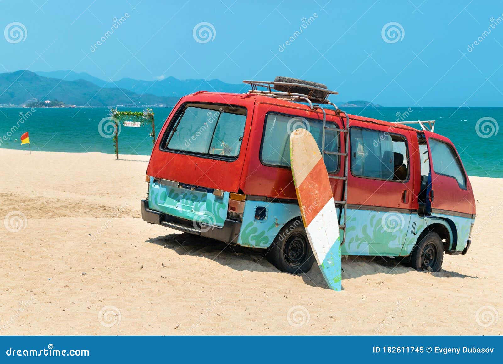 Old Bus in the Sand and a Surfboard on the Beach Stock Image - Image of ...