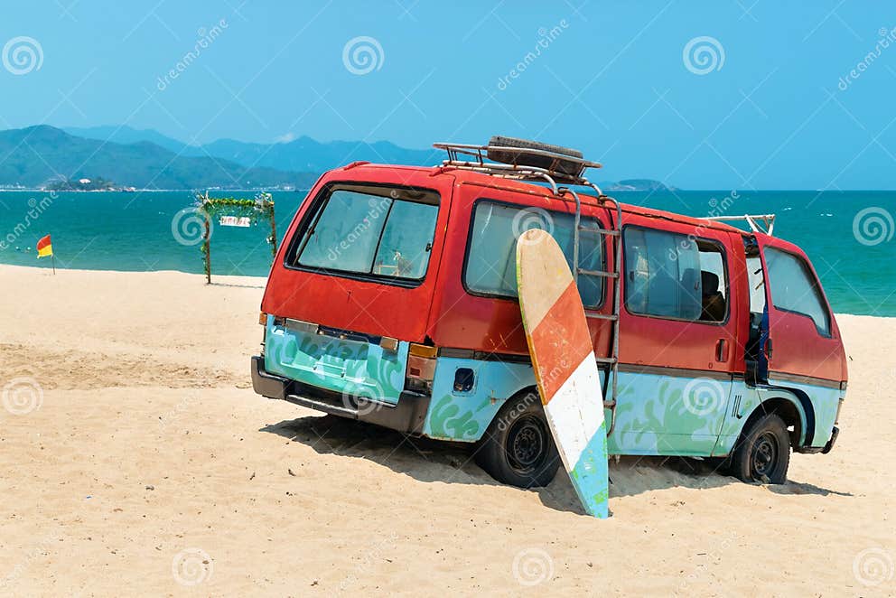Old Bus in the Sand and a Surfboard on the Beach Stock Image - Image of ...