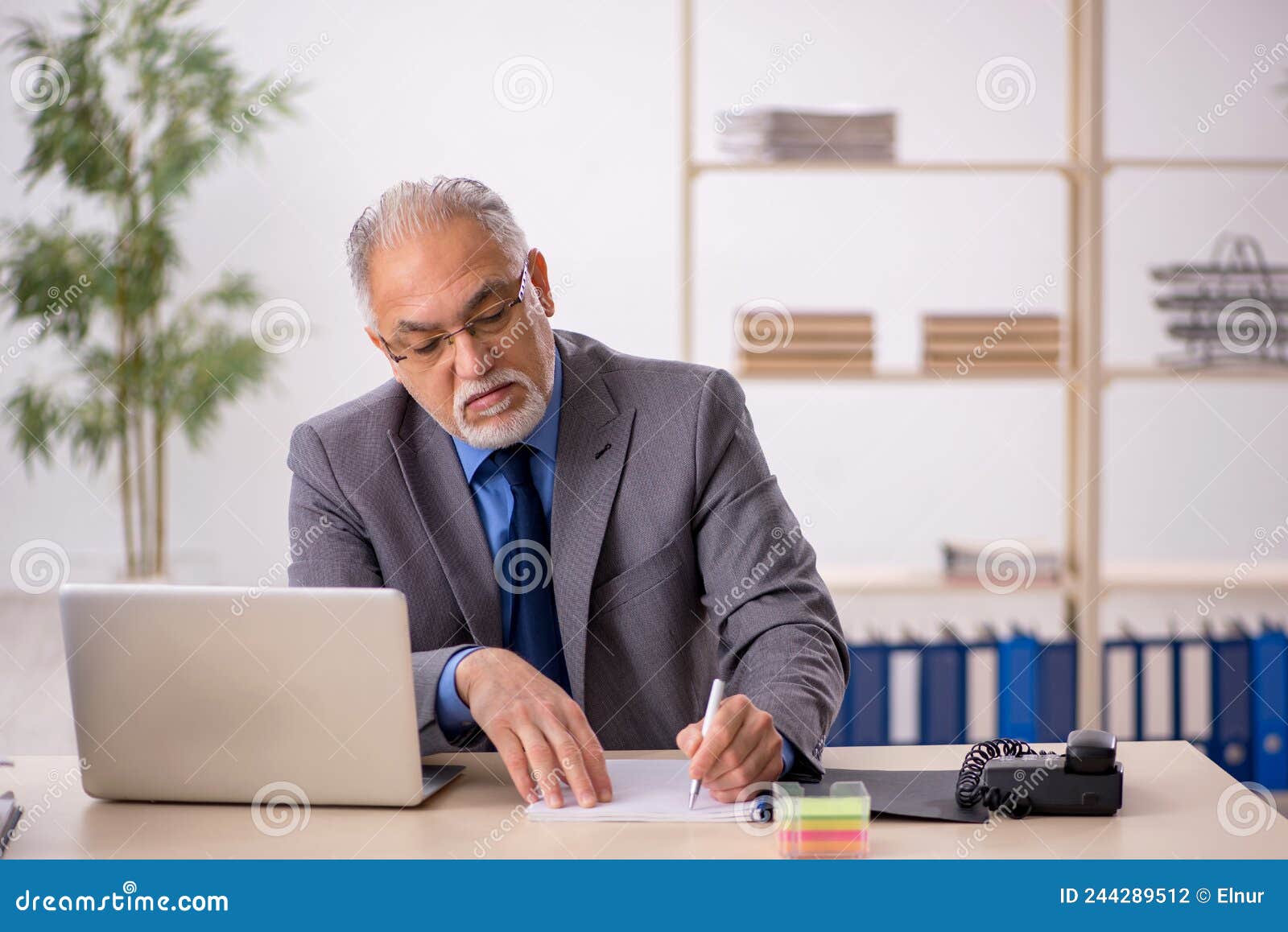 Old Male Employee Working at Workplace Stock Photo - Image of business ...