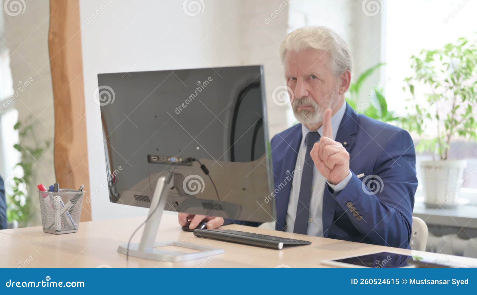 Senior Old Businessman Shaking Head in Rejection while Using Desktop ...