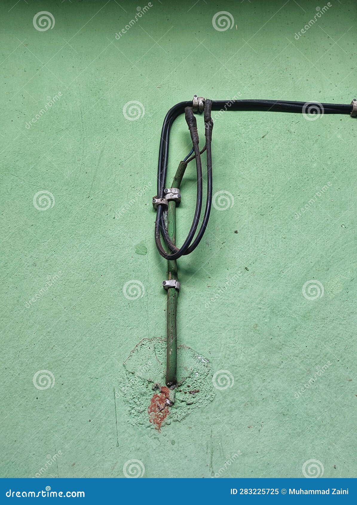 Old Cables on the Green Wall of the House. Bad Installation of ...