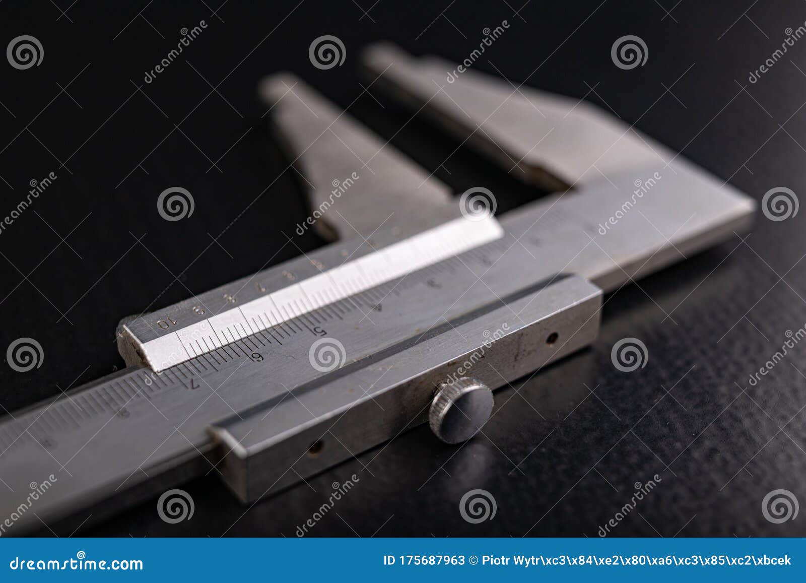 Old Caliper on a Dark Table. Traditional Measuring Accessories Stock ...