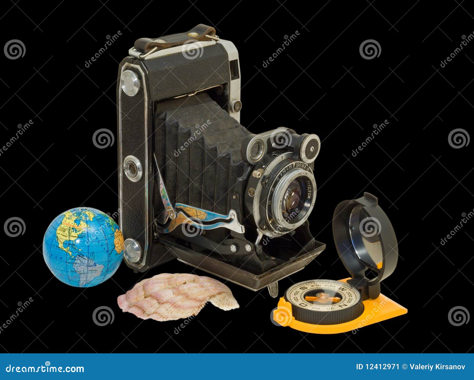 Old camera and compass 2 stock image. Image of close - 12412971