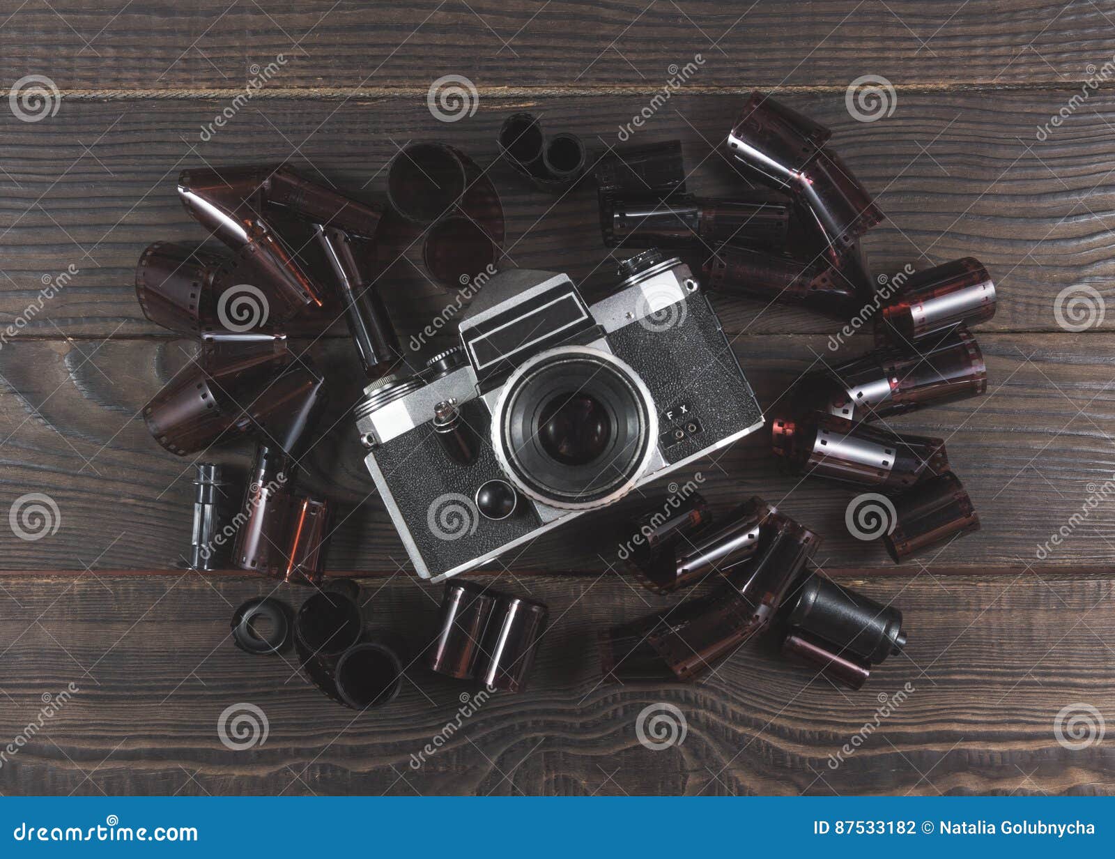 Old Camera and Films are on the Dark Wooden Surface Stock Photo - Image ...