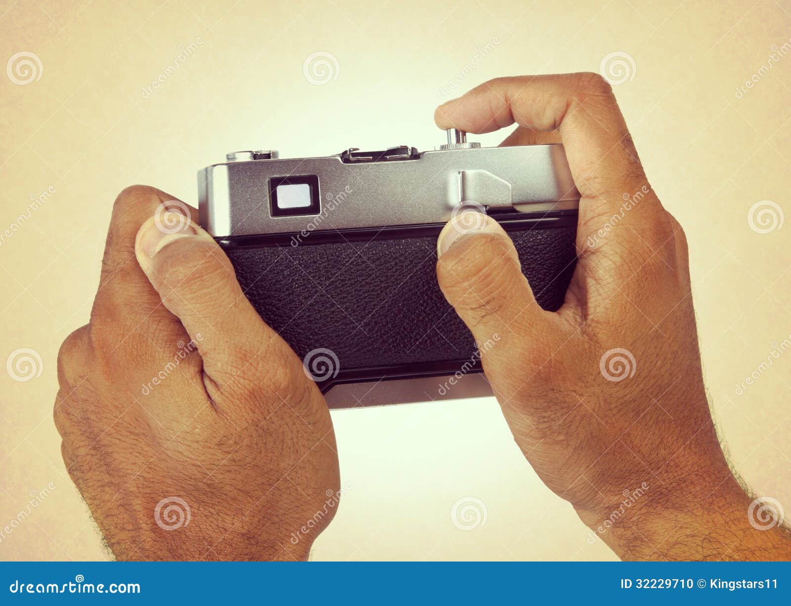 Old camera in hand stock photo. Image of snapshot, color - 32229710