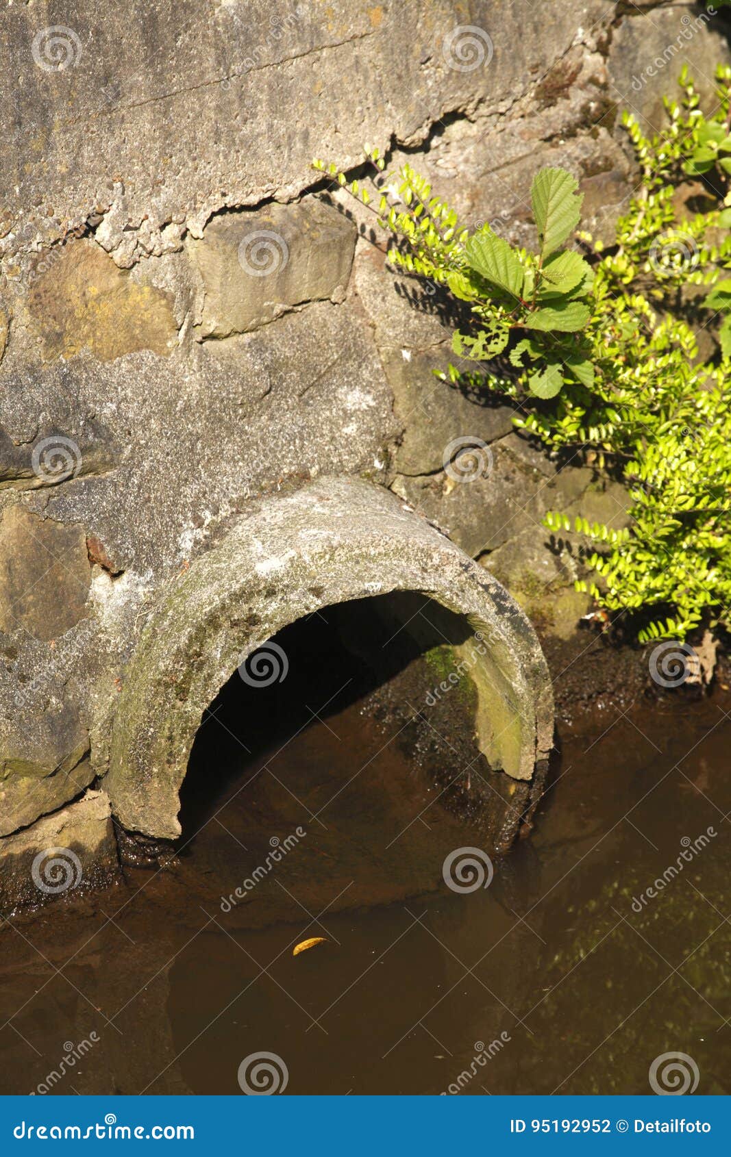 Old canal pipe, stone wall stock photo. Image of sewage - 95192952