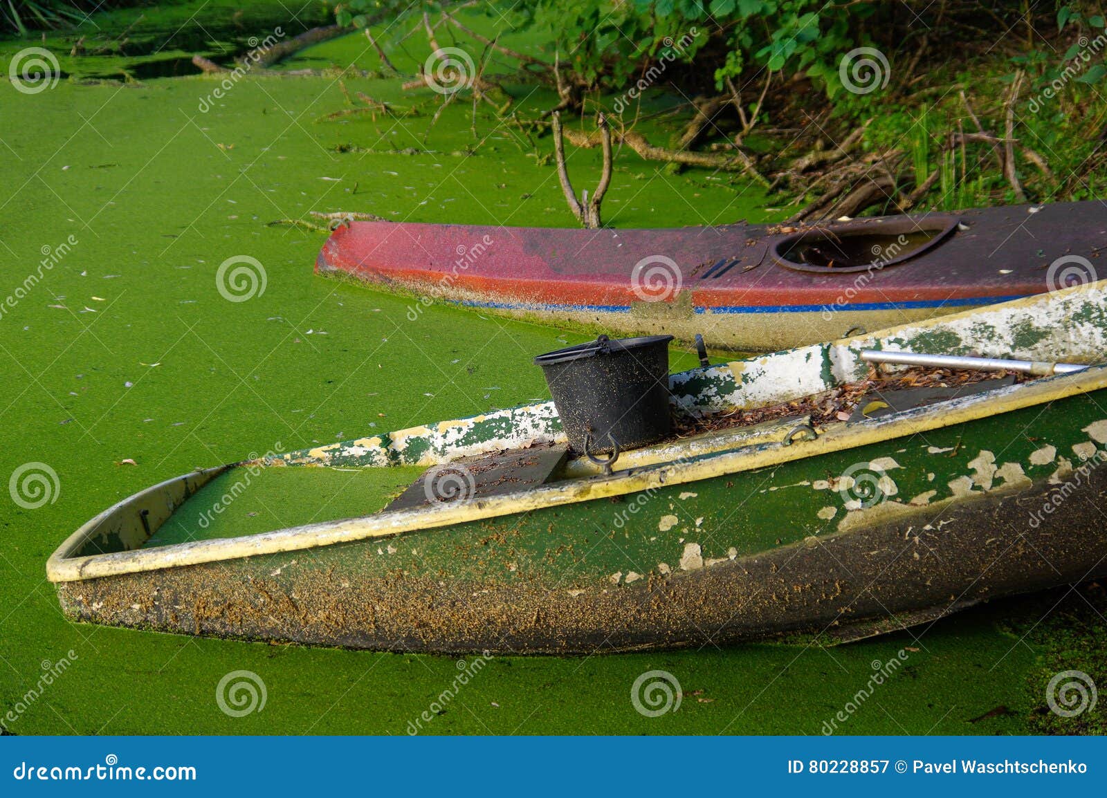 Old Canoe and a Wooden Boot Ashore the Pond with Bucket on it Stock ...