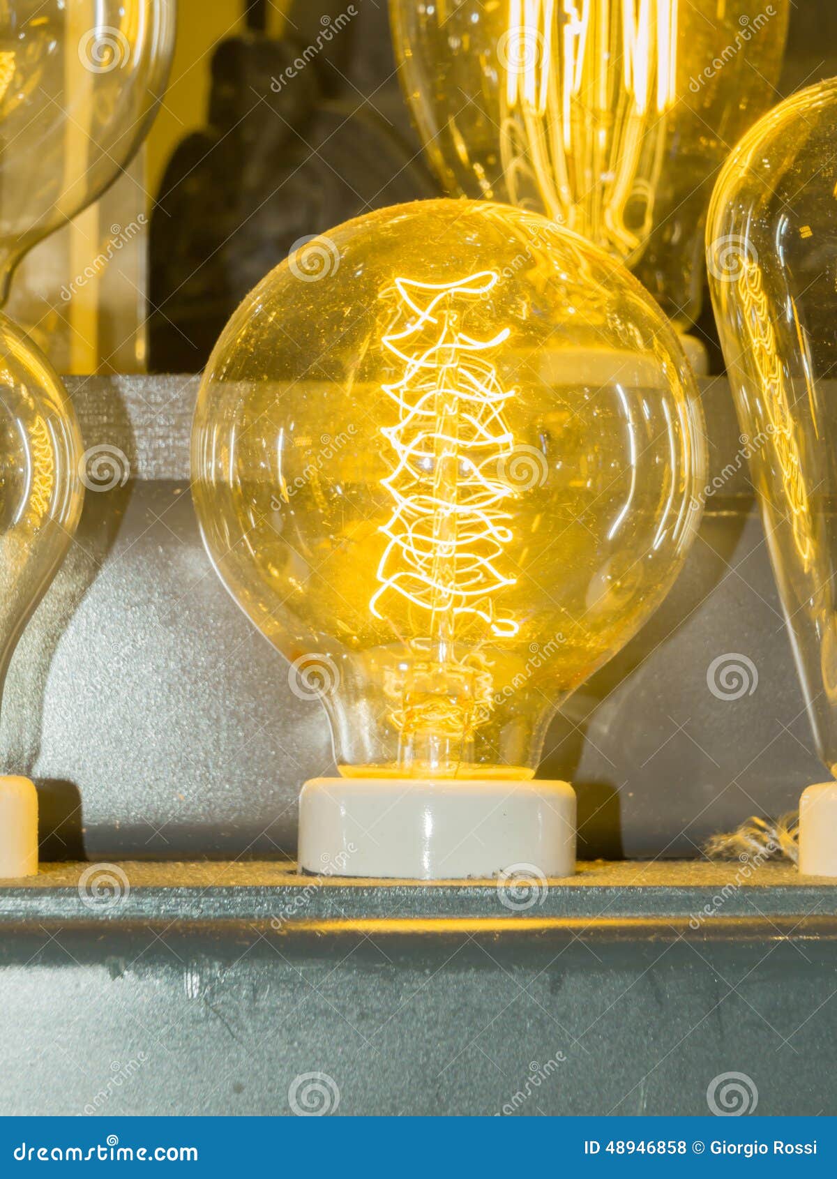 Old Carbon Light Bulb Filament Stock Photo - Image of glass, filament ...