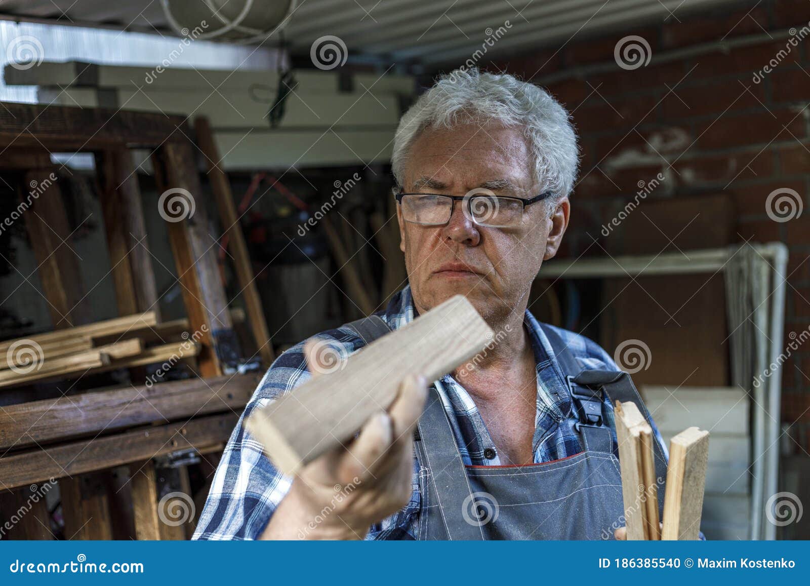 Old Carpenter Checking the Wood Planks Stock Photo - Image of elderly ...