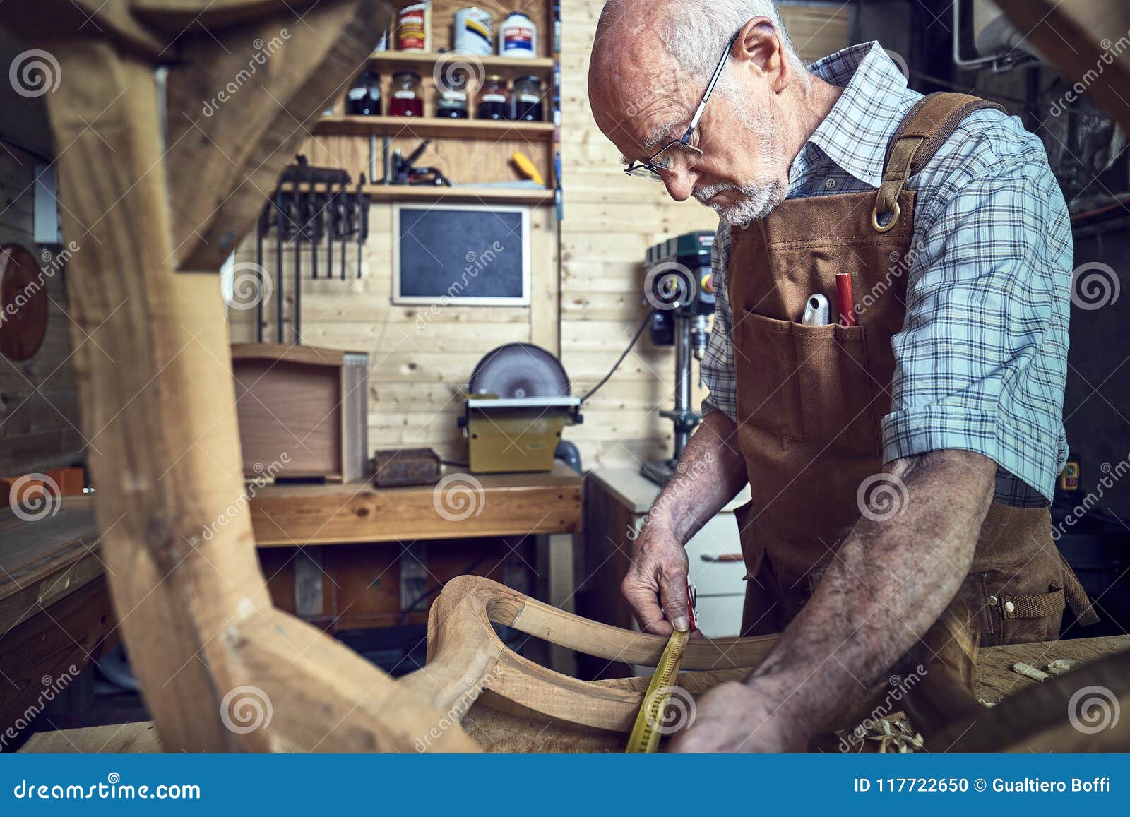 Old carpenter at work stock photo. Image of professional - 117722650