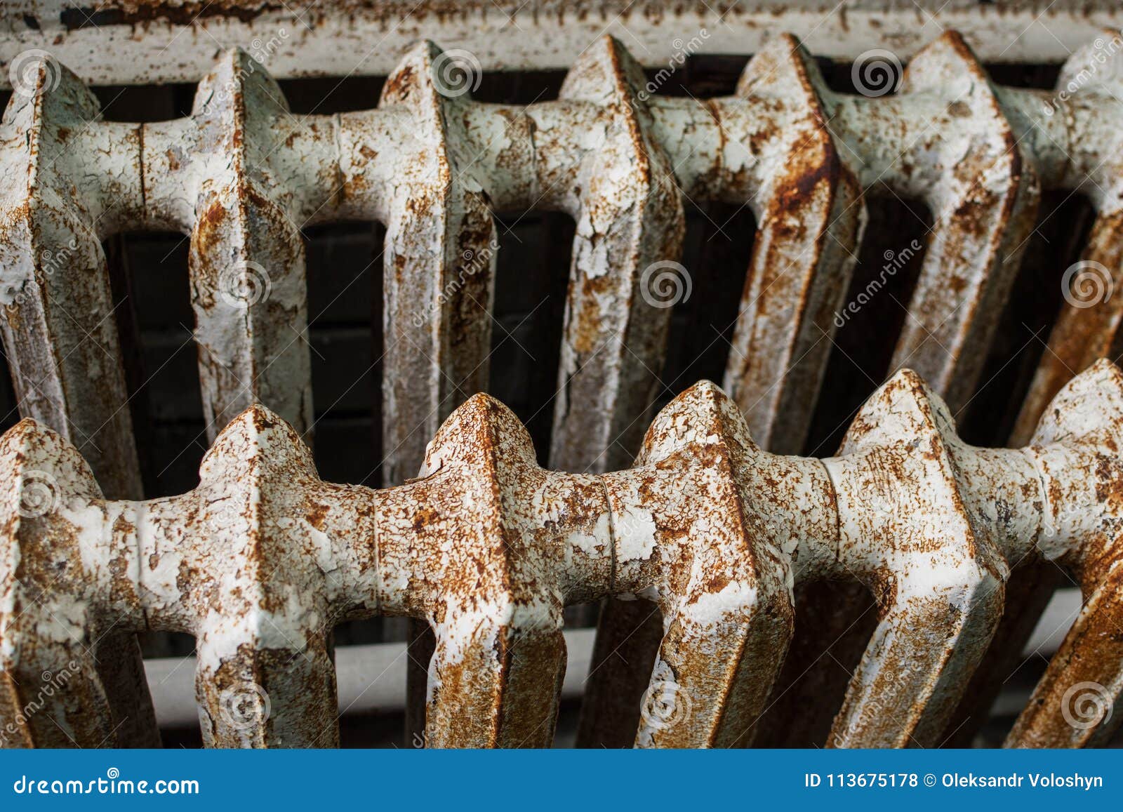Old Cast-iron Battery. Vintage Rusty Battery Section. Stock Photo ...