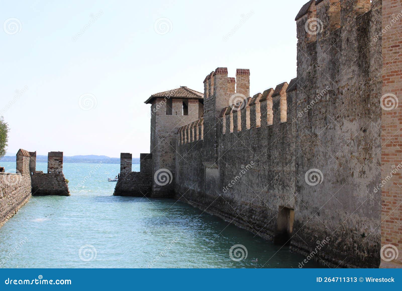 Old Castle Built on a River Against the Blue Sky Stock Image - Image of ...