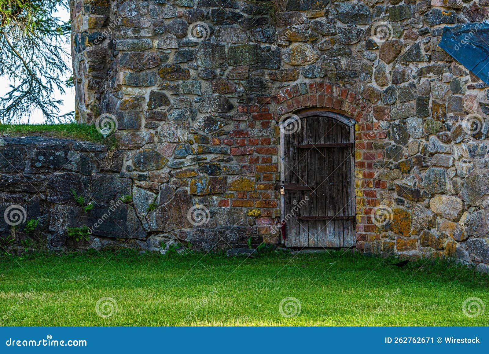 Old Castle Wall with a Wooden Door Stock Image - Image of building ...