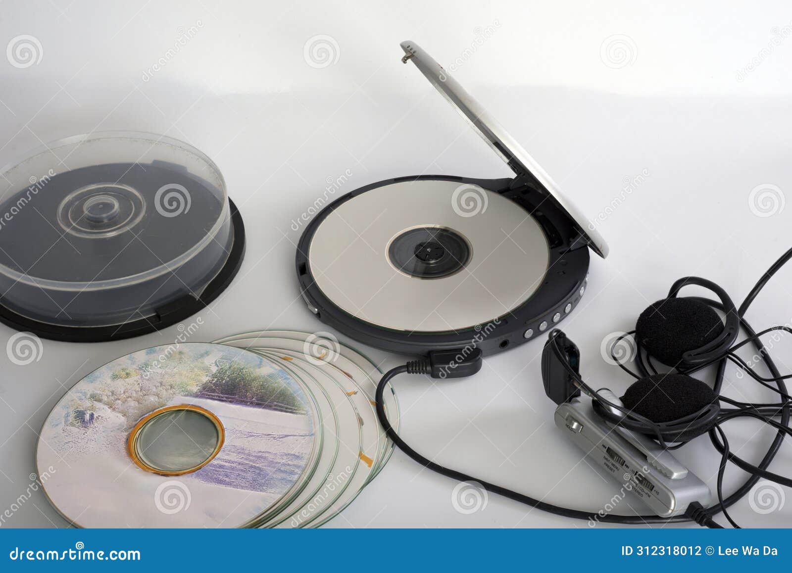 A Old CD-Player with Compact Discs. White Background. Studio Shot Stock ...