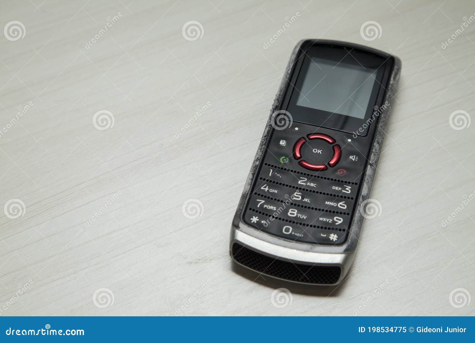 Old Cellular Device Placed on the Table Top in the Home Office Stock ...