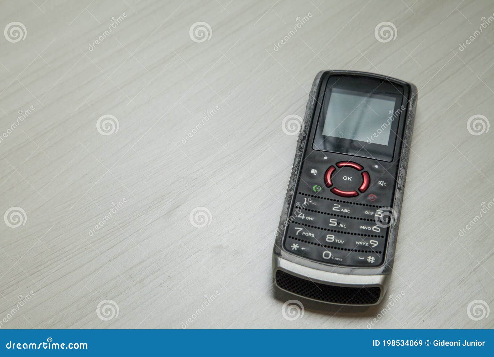 Old Cellular Device Placed on the Table Top in the Home Office Stock ...