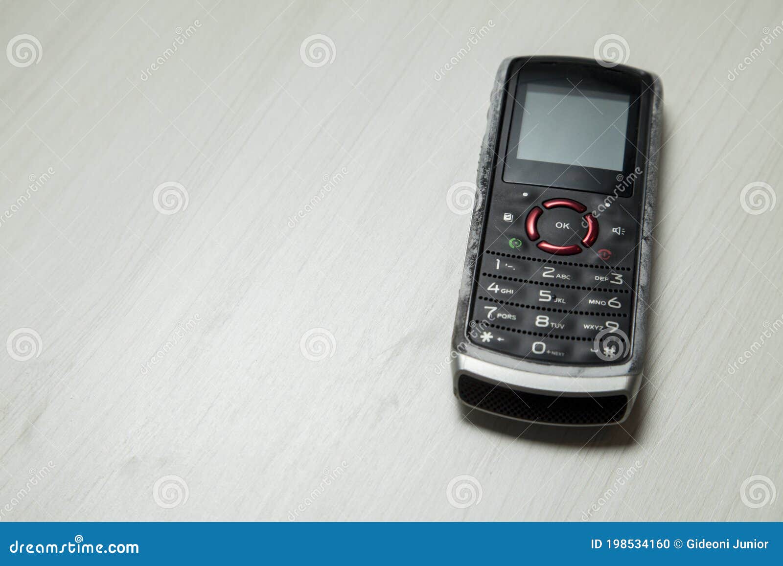 Old Cellular Device Placed on the Table Top in the Home Office Stock ...