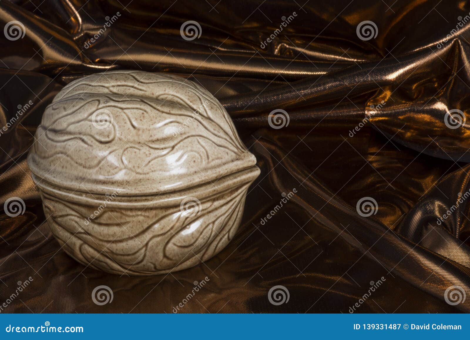 Walnut ceramic candy dish stock image. Image of metallic - 139331487