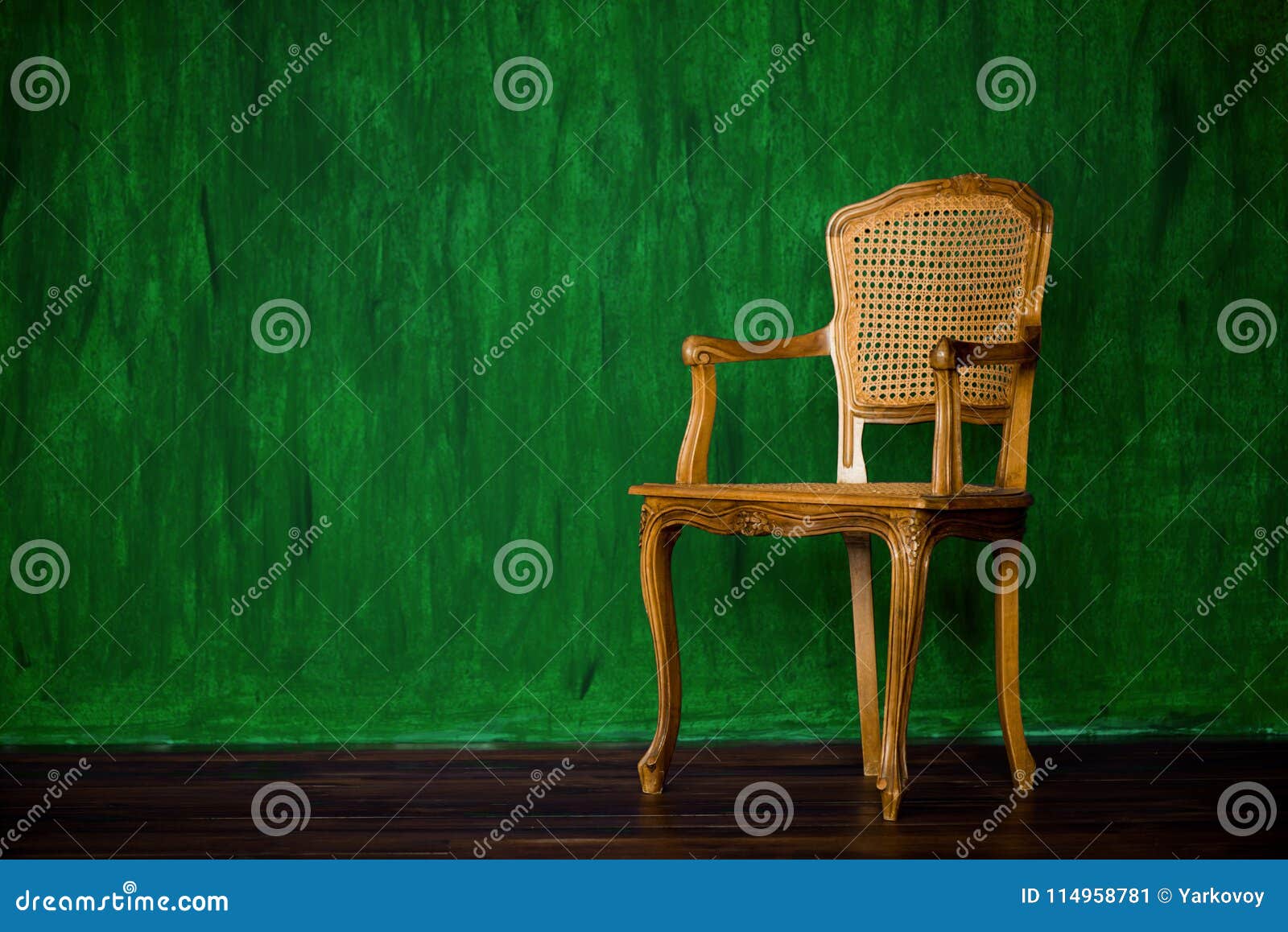 Old Chair on a Green Wall Background. Stock Image - Image of background ...