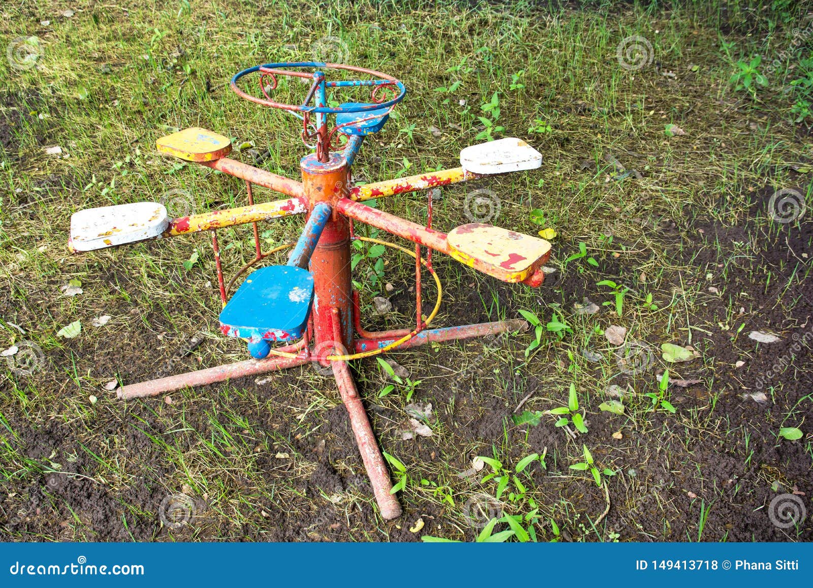 Old Children Carousel in Playground. Old Metal Carousel at Playground ...