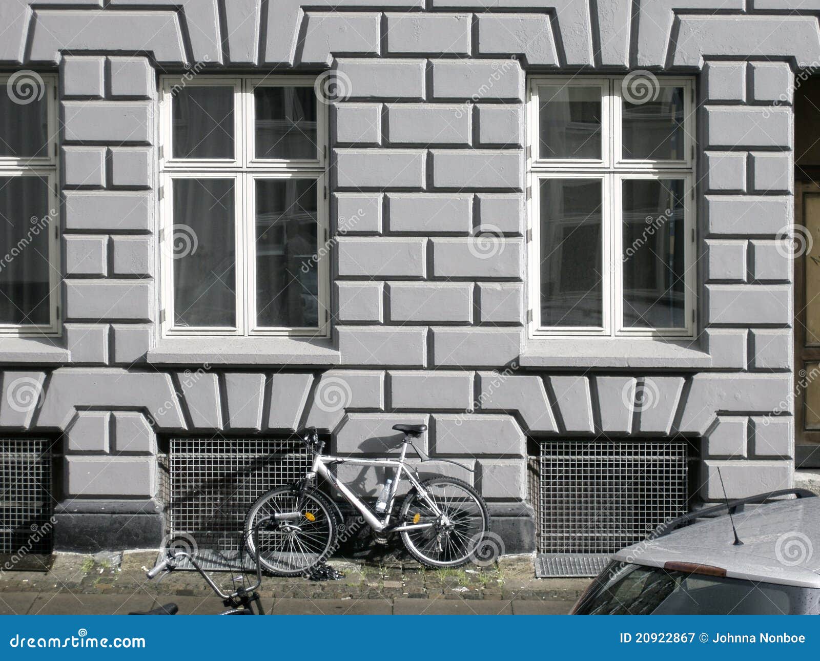 Old City House Facade with a Bike Under Windows Stock Image - Image of ...