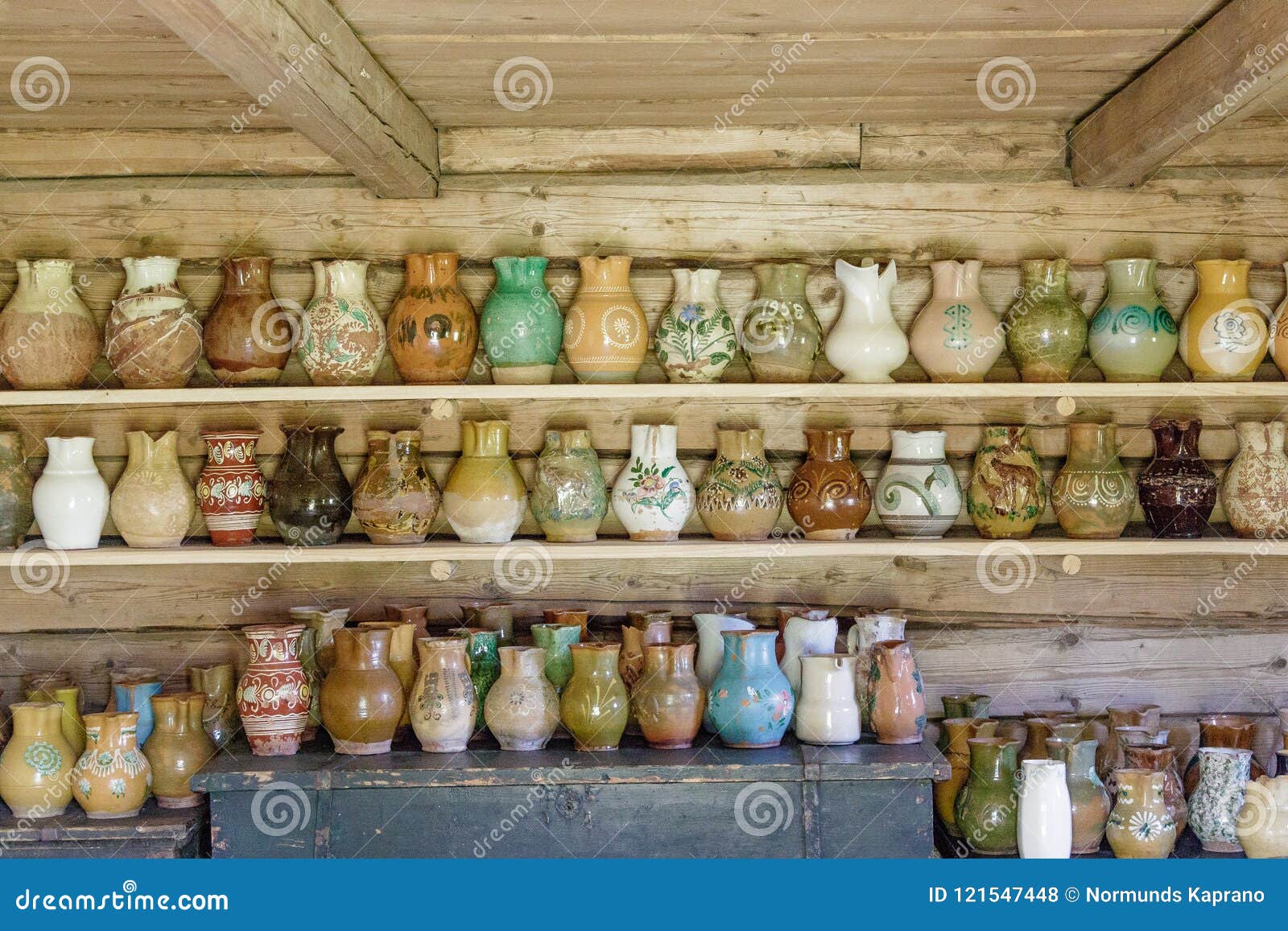 Clay containers on a shelf stock photo. Image of division - 121547448