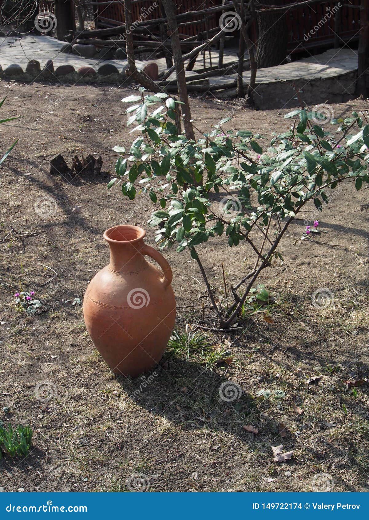 Old Jug on the Ground in the Yard of a Roadside Restaurant Stock Photo ...