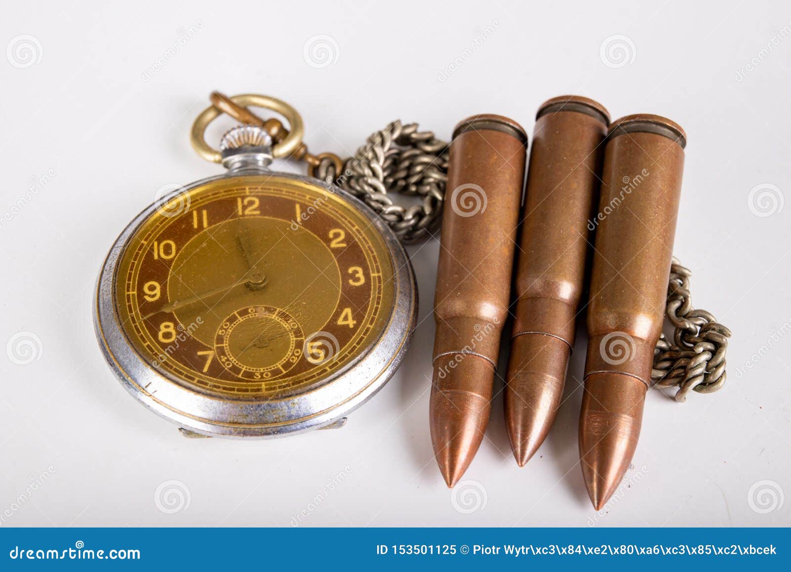 Old Clock and Ammunition on a White Table. Explosive Material and Time ...