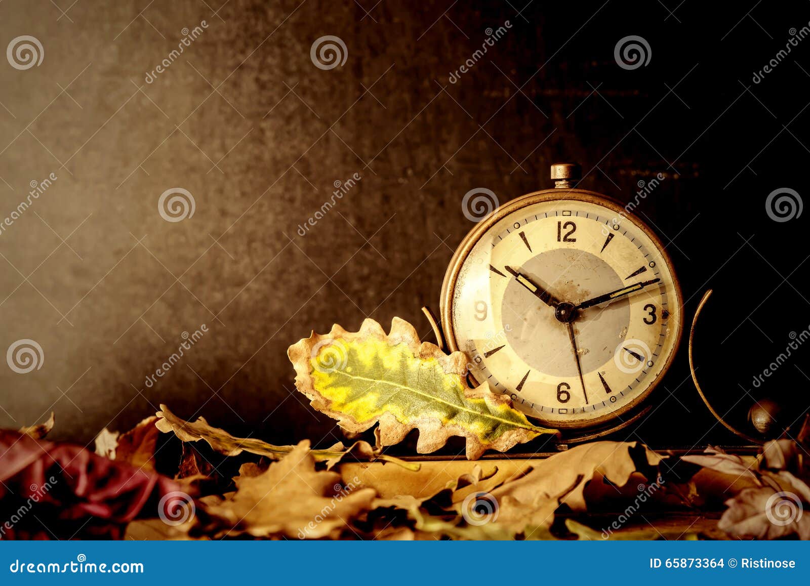 Old Clock and Autumn Leaves Background Stock Photo - Image of alarm ...