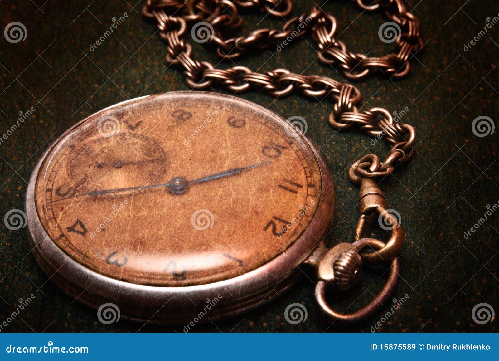 Old Clock with Chain Lying on Rough Green Surface Stock Image - Image ...