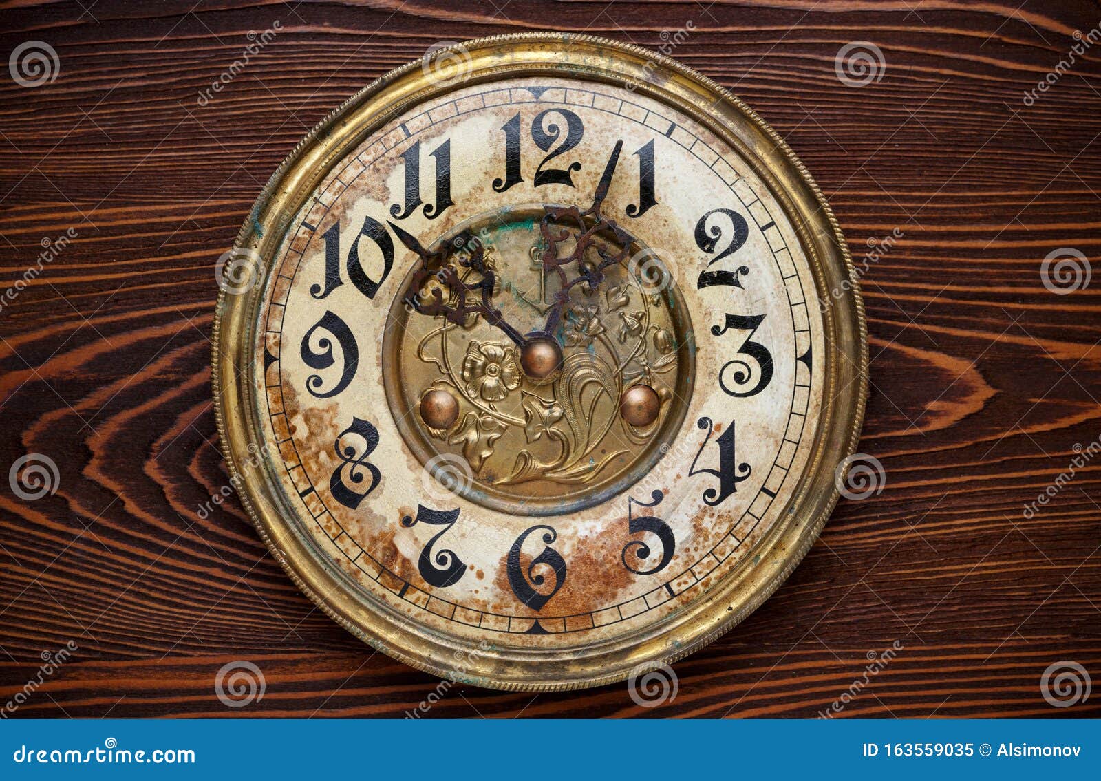 Old Clock with a Rusty Clock Face on Wooden Background Stock Image ...
