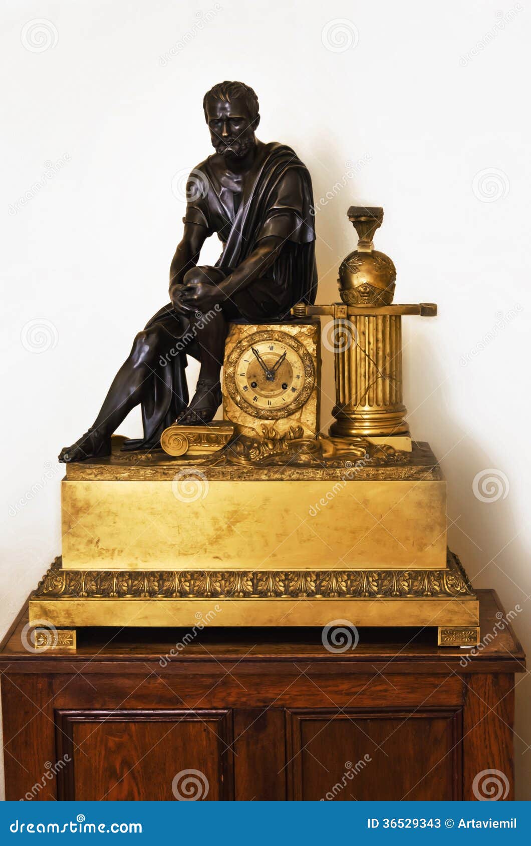 Old clock and statue stock image. Image of oldfashioned - 36529343