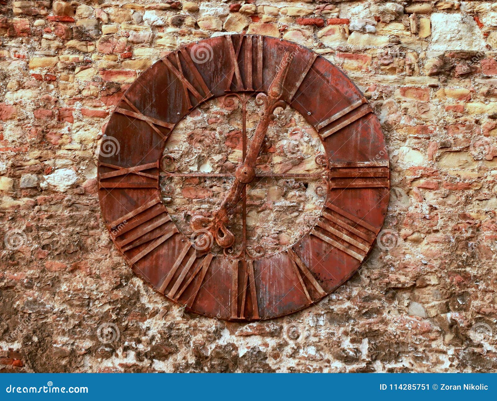 Old Rusted Clock on the Stone Wall Stock Image - Image of removing ...