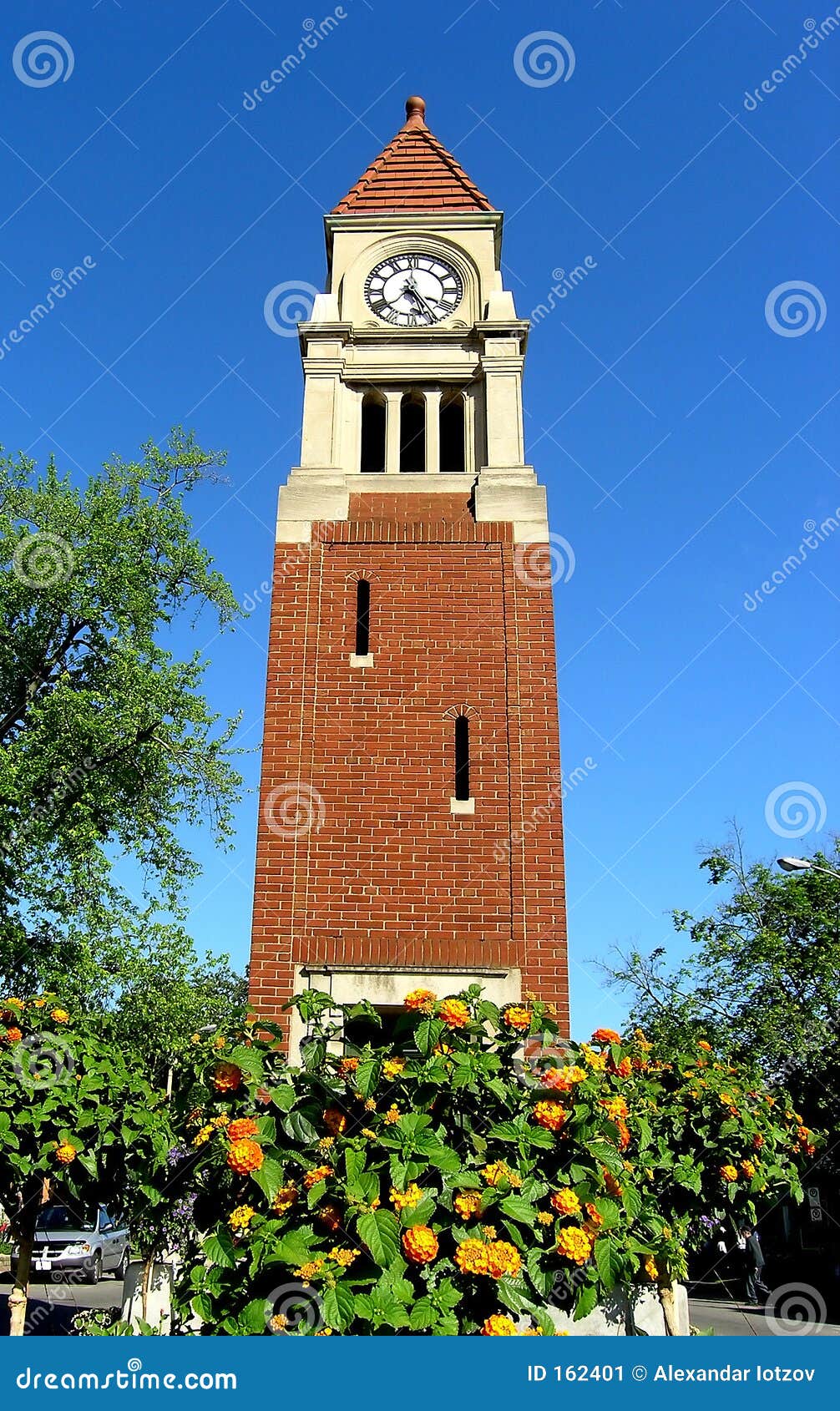 Old clock tower. stock image. Image of building, flowers - 162401