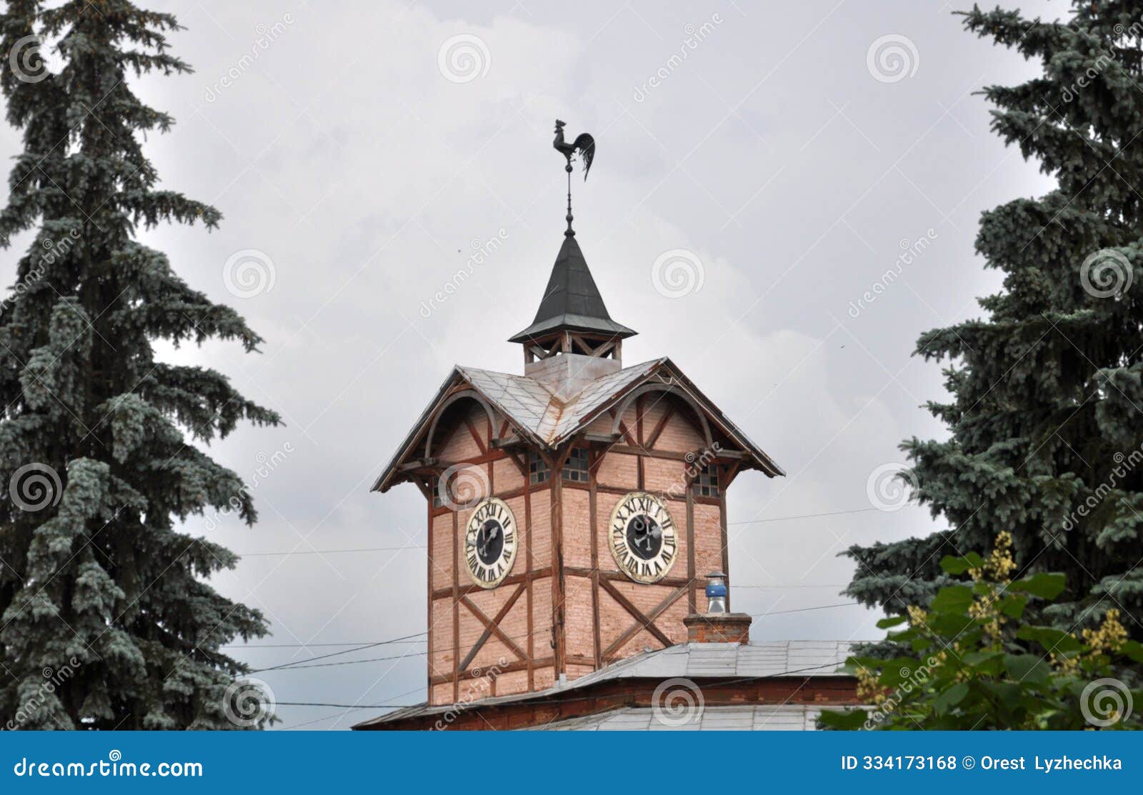 Old Clock Tower with a Rooster on the Spire Stock Photo - Image of ...
