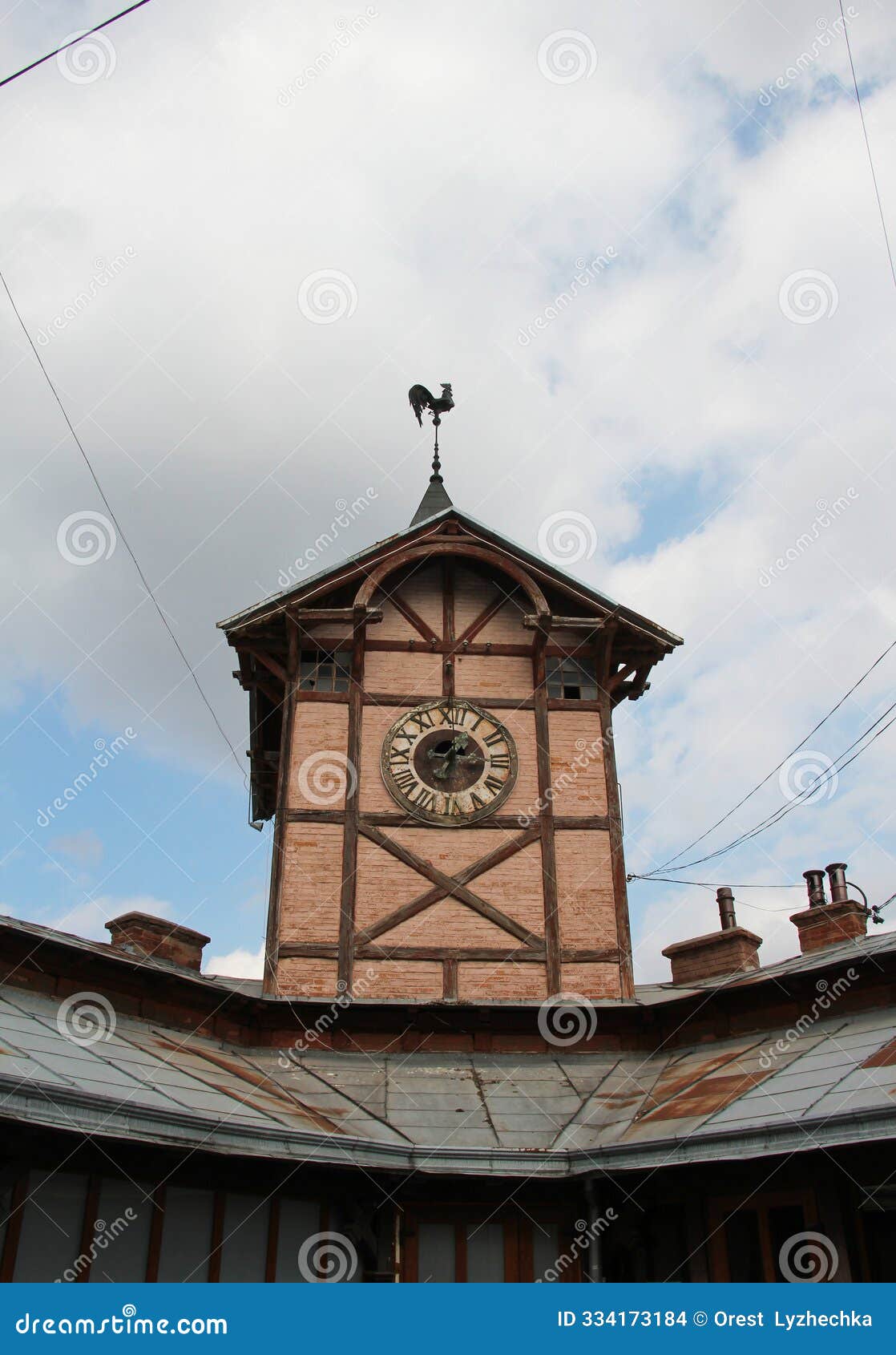 Old Clock Tower with a Rooster on the Spire Stock Photo - Image of ...