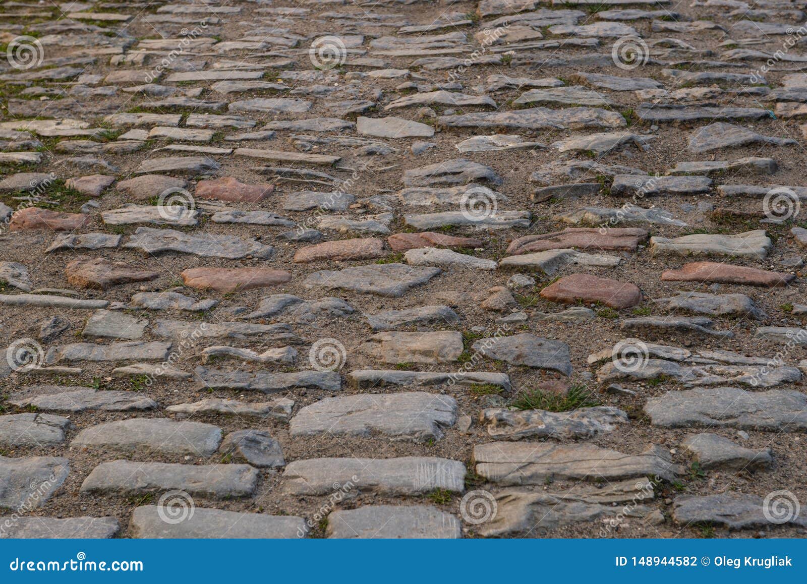 Old cobbles on city road stock photo. Image of boulevard - 148944582