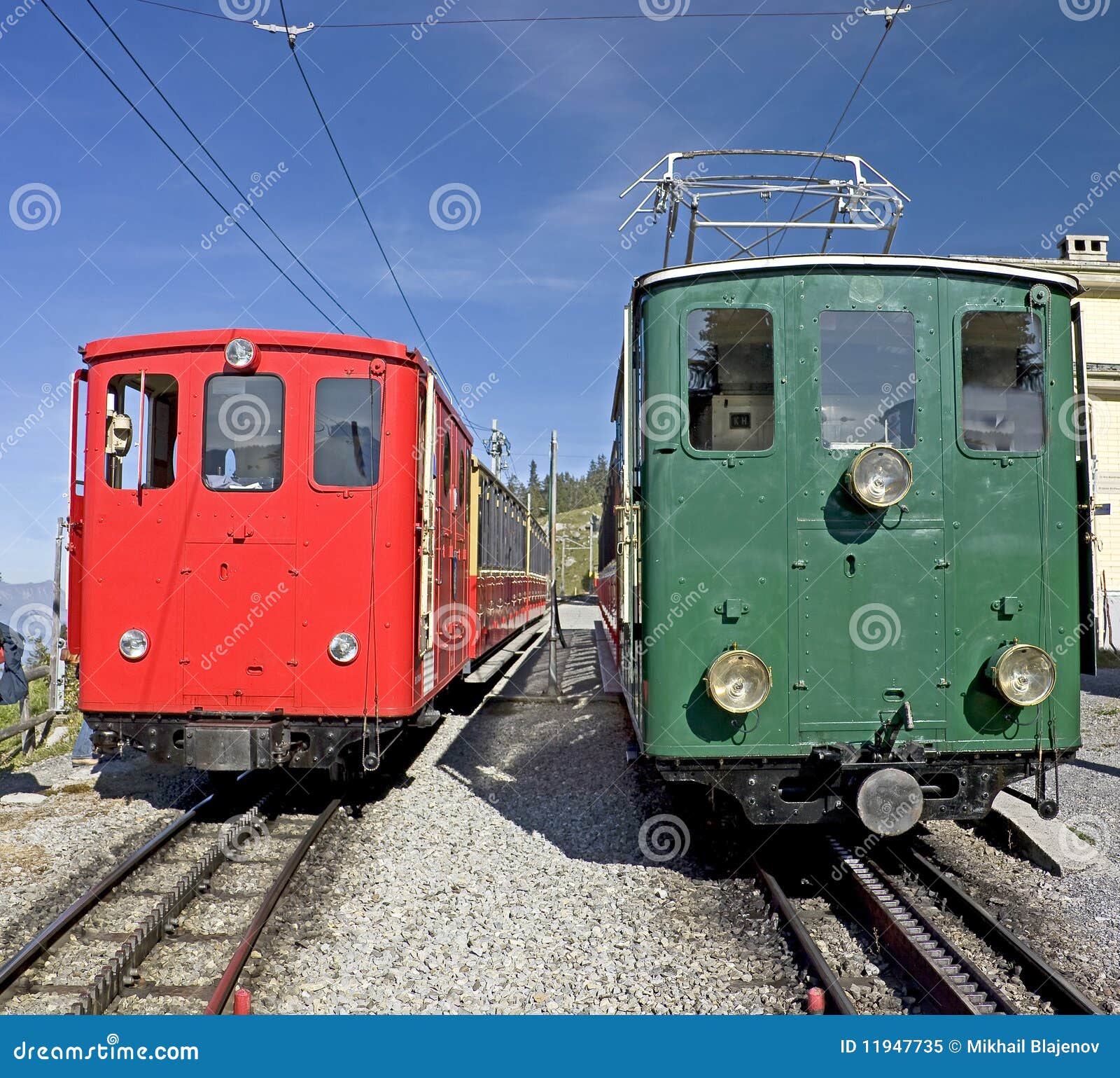 A Cog Wheel Train Traveling On The Mountain Railway From Wengen To ...