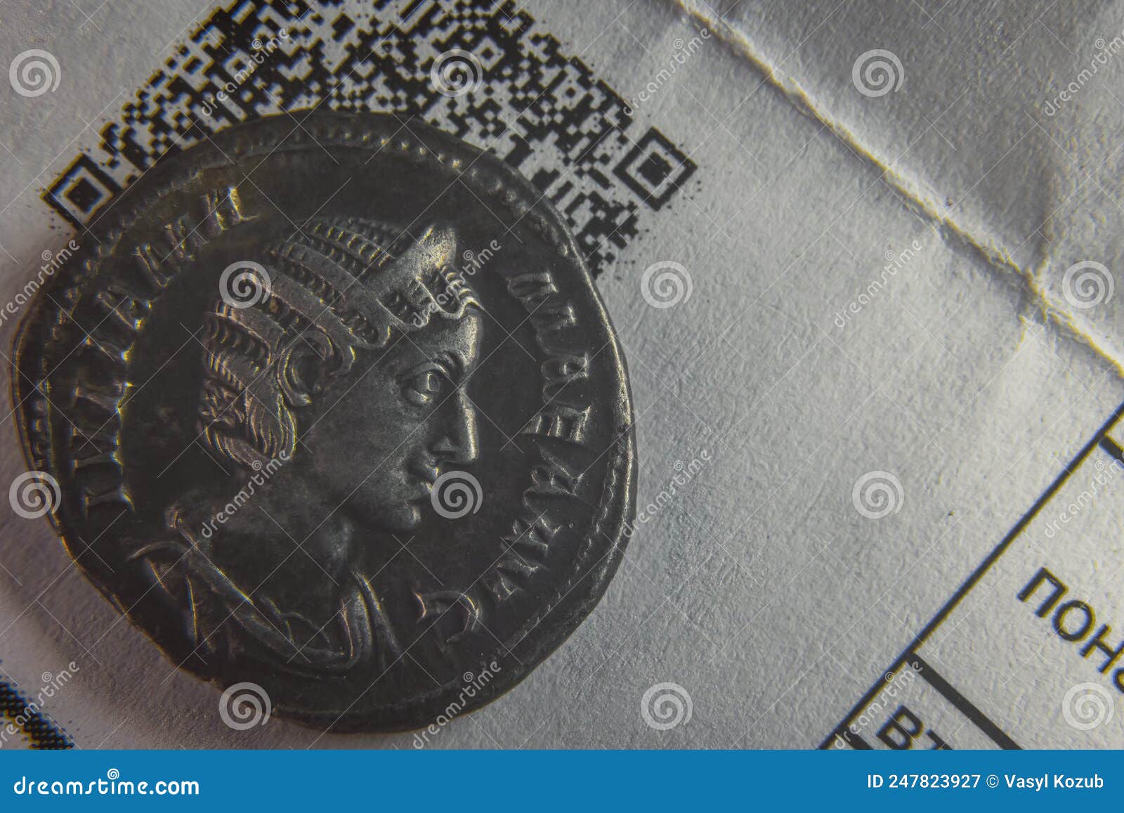 An Old Coin on a Sheet of Paper with a Cuar Code Stock Image - Image of ...