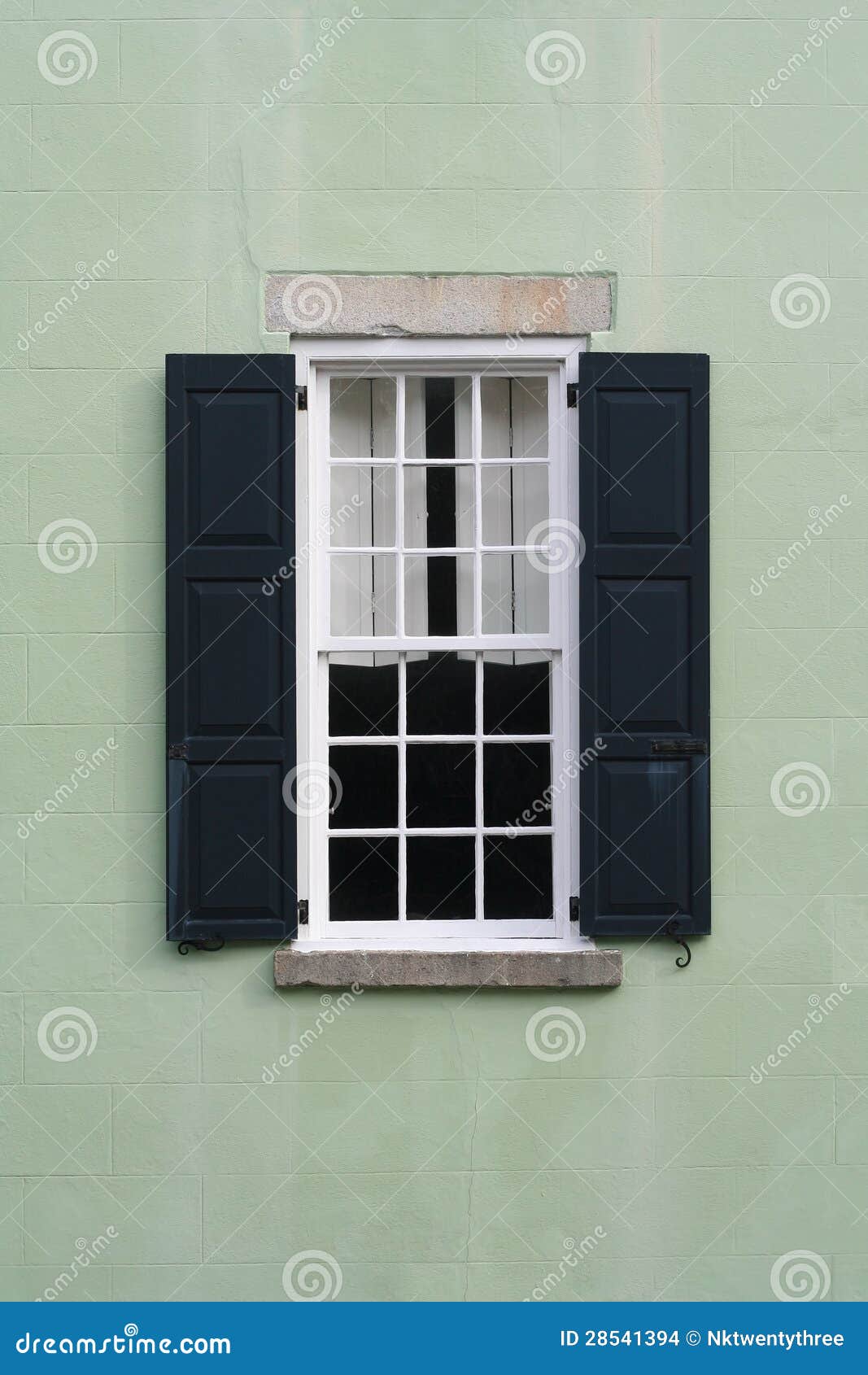 A Colonial Ear Window With A Small Balcony With Eroded Stucco Siding ...