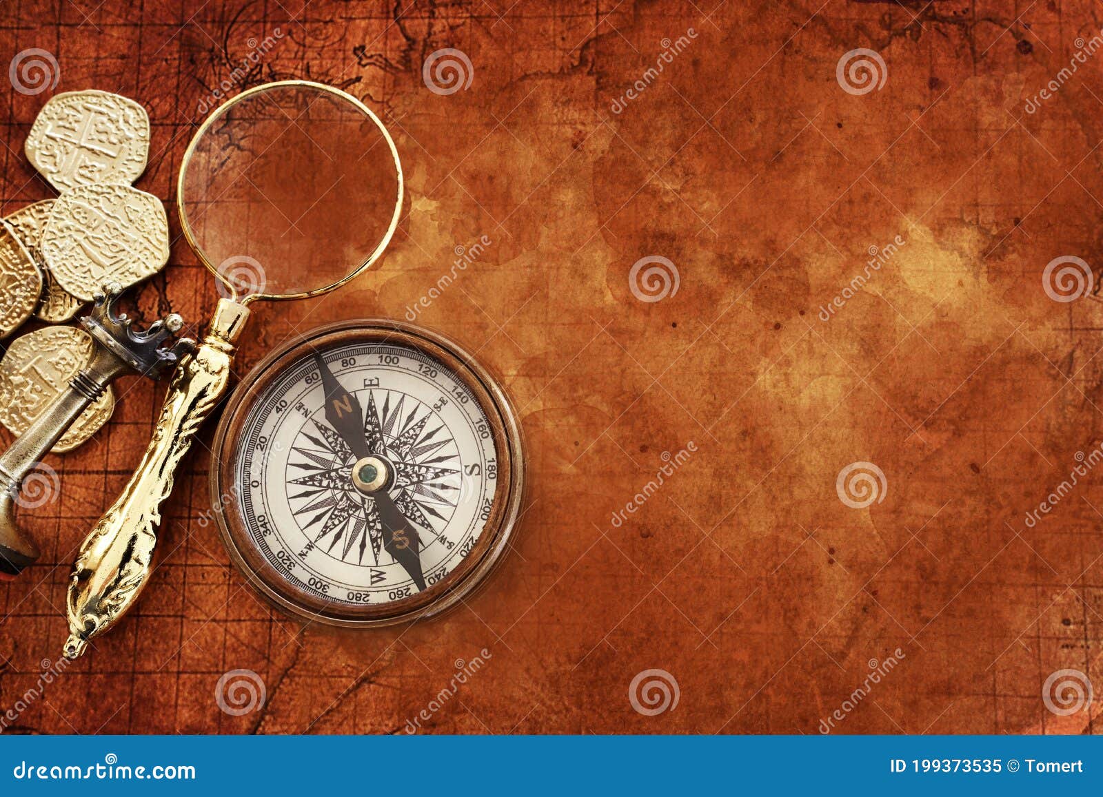 Coins In Treasure Chest With Compass And Magnifying Glass Royalty-Free ...
